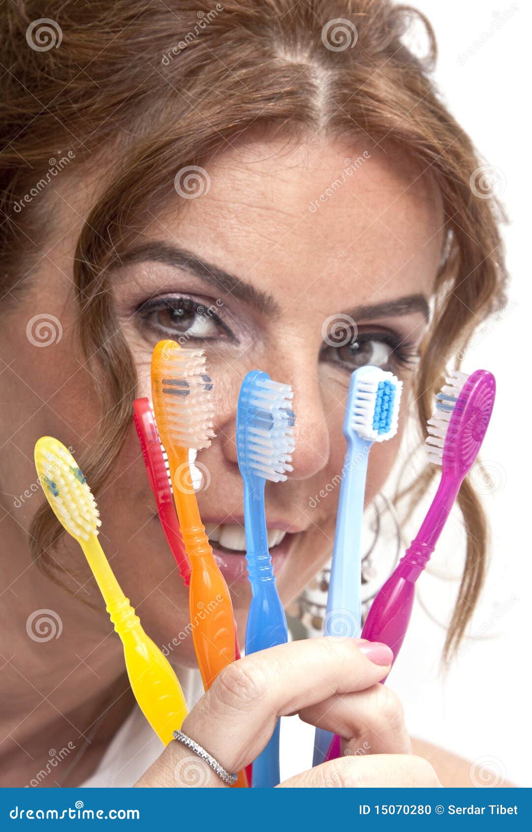 Woman with tooth brushes stock photo. Image of brushing - 15070280