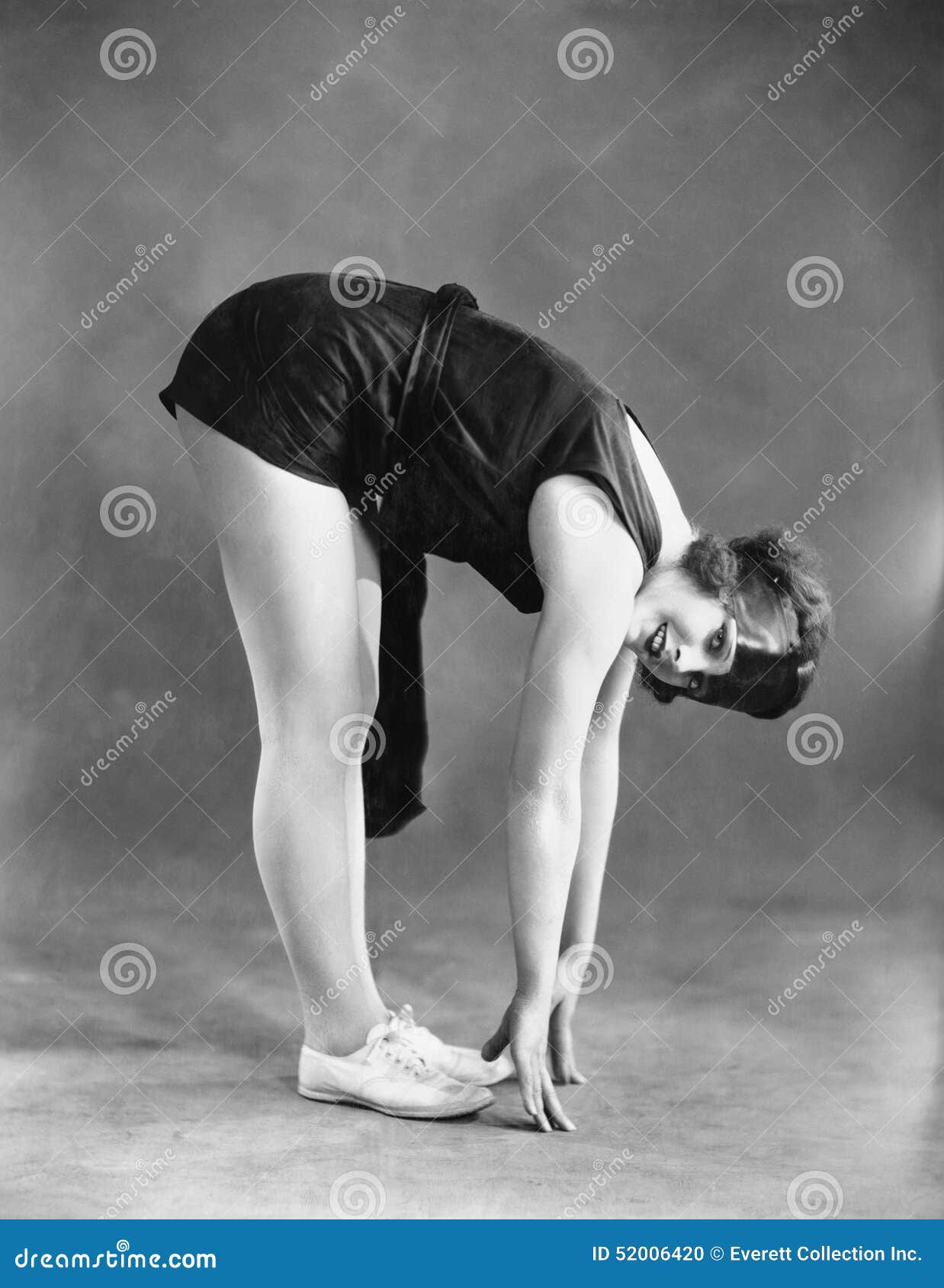 Woman touching toes stock photo. Image of enjoying, bending - 52006420