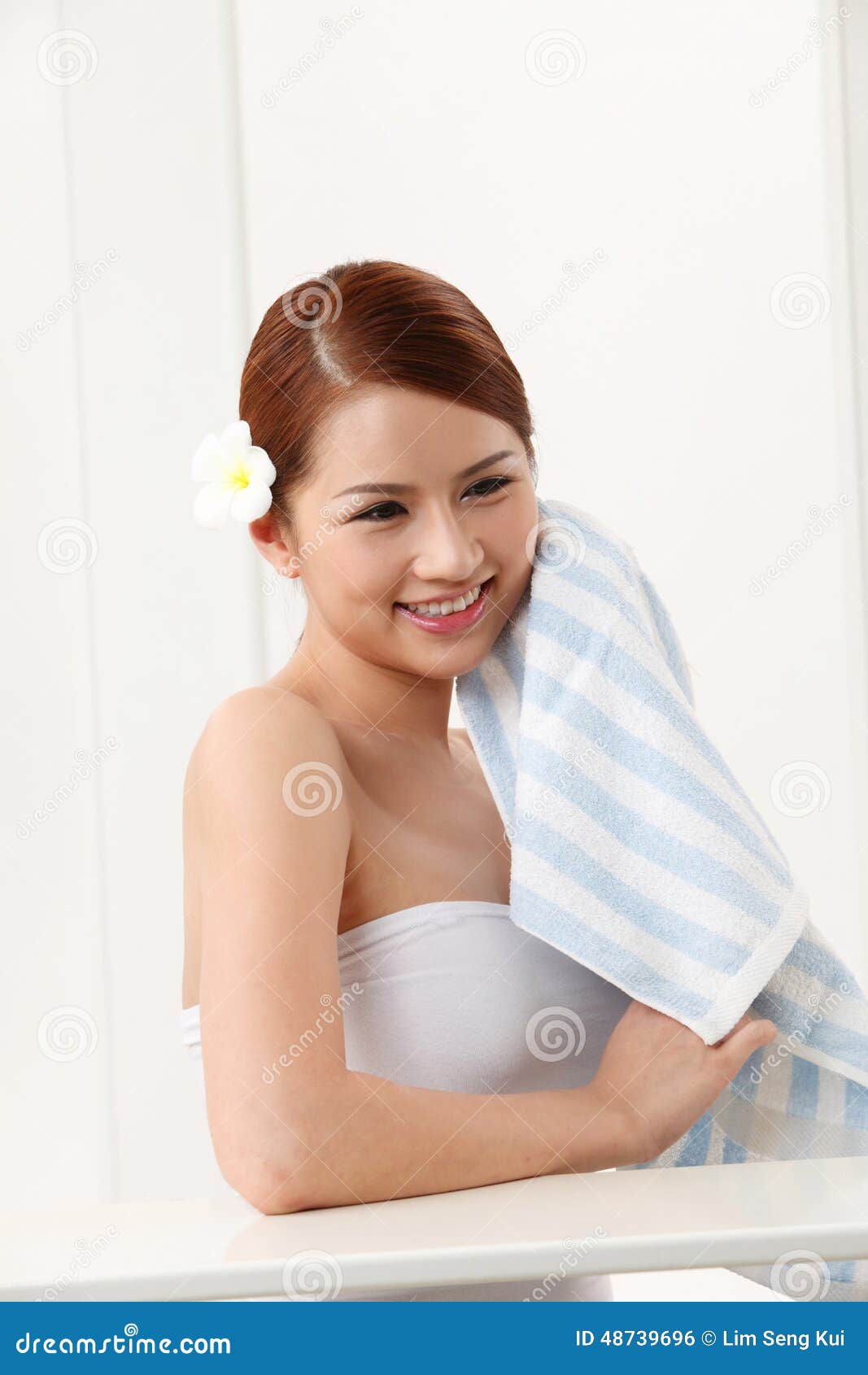 Woman with towel stock photo. Image of people, flower - 48739696