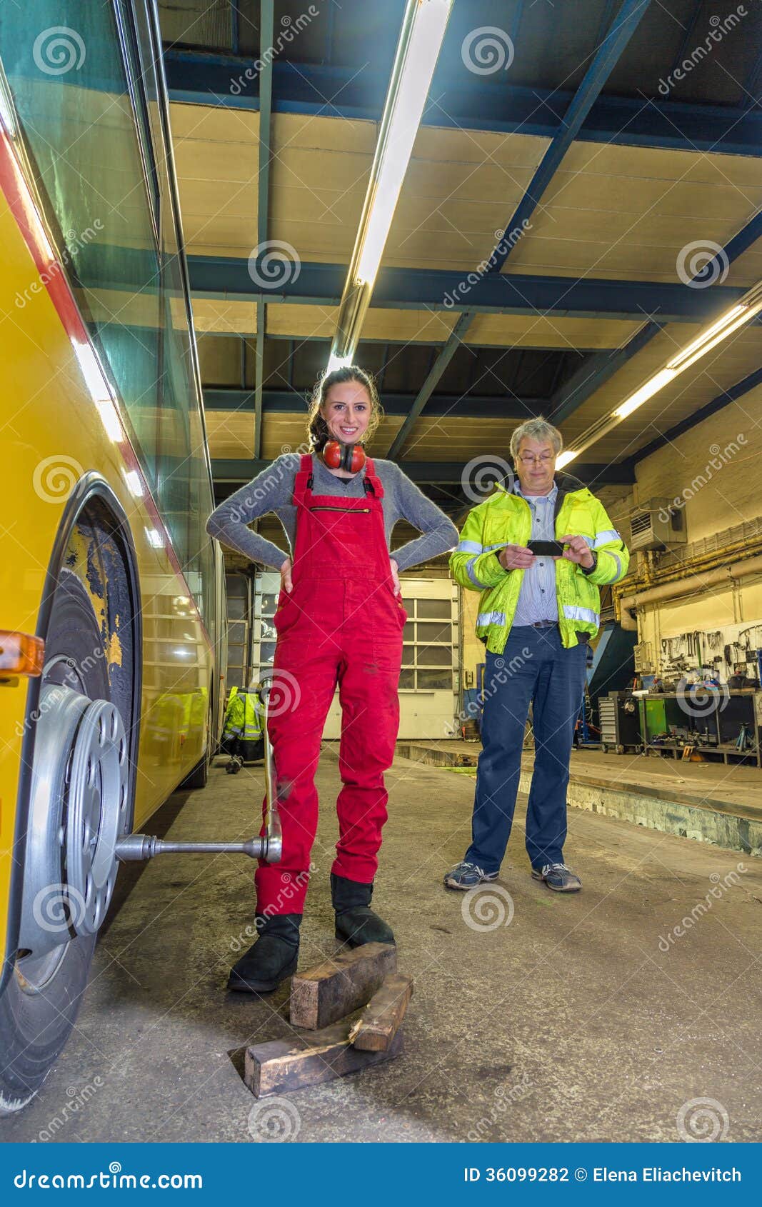 Woman, Trainee, Working in the Bus Workshop Stock Photo - Image of ...
