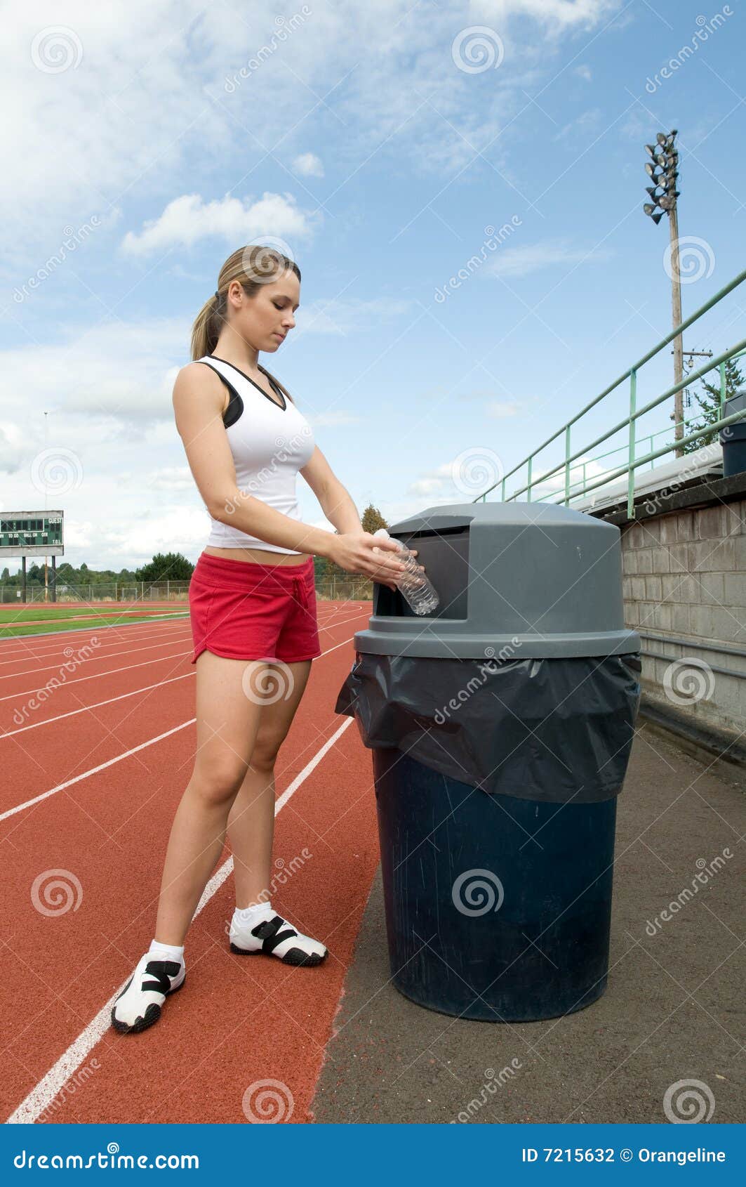 Woman by Trash Can stock photo. Image of standing, upright - 7215632