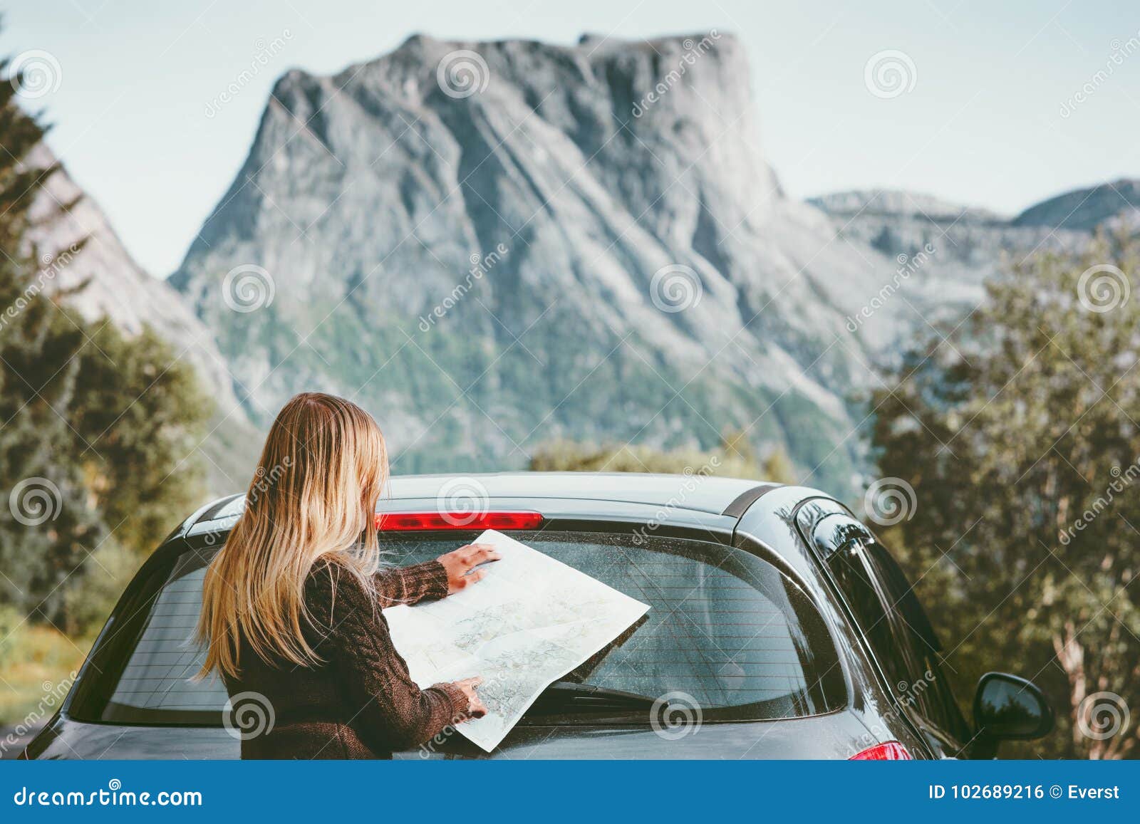 Woman Traveling By Car On Road Trip With Map Planning Route Lifestyle Concept Adventure