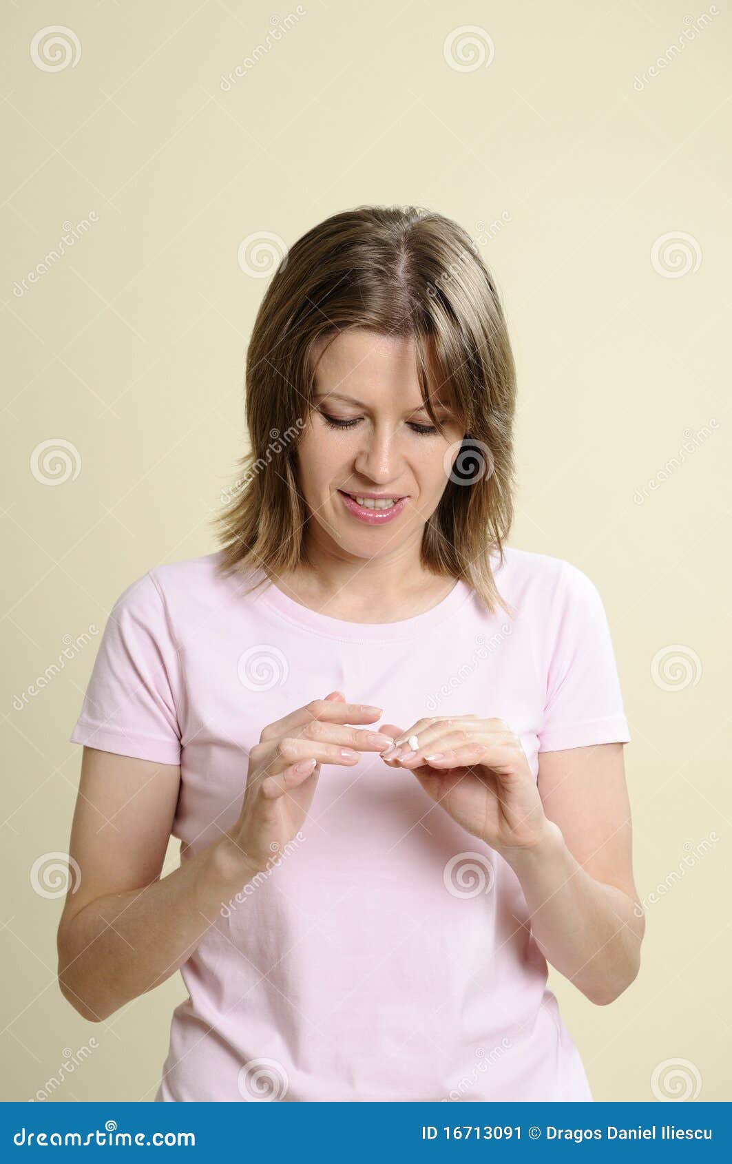 Woman treating her hands stock image. Image of human - 16713091