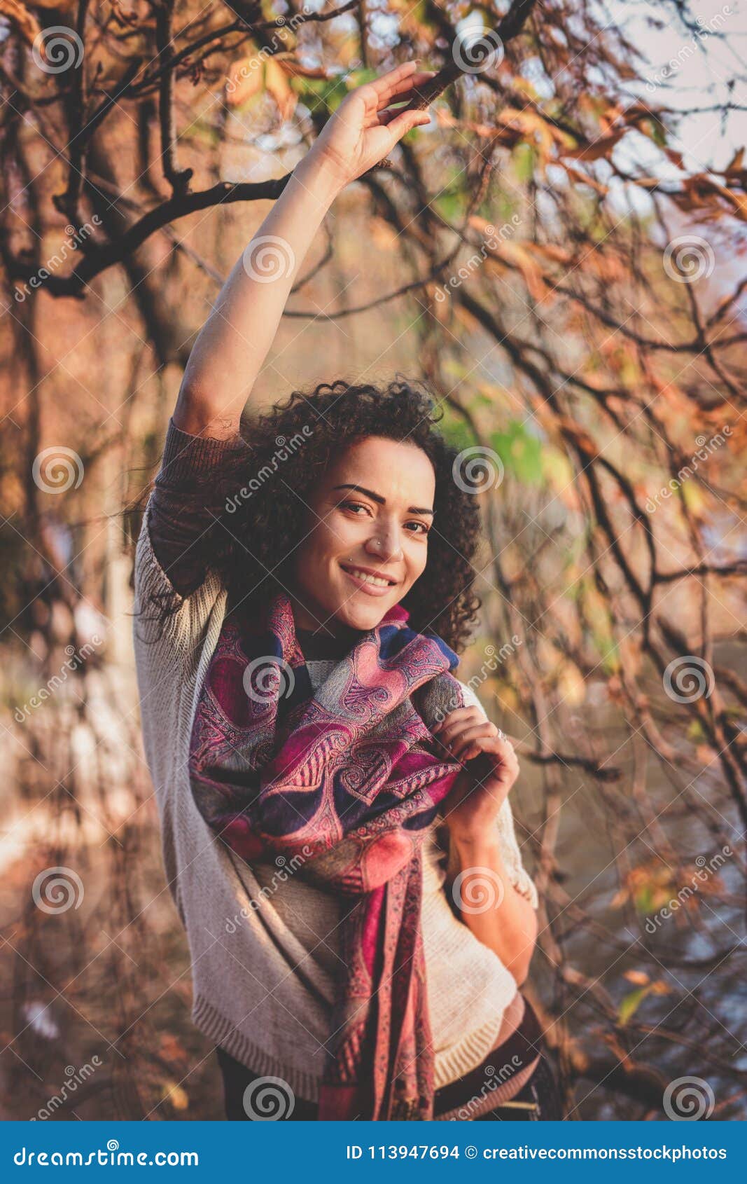 Woman Beside A Tree Picture. Image: 113947694