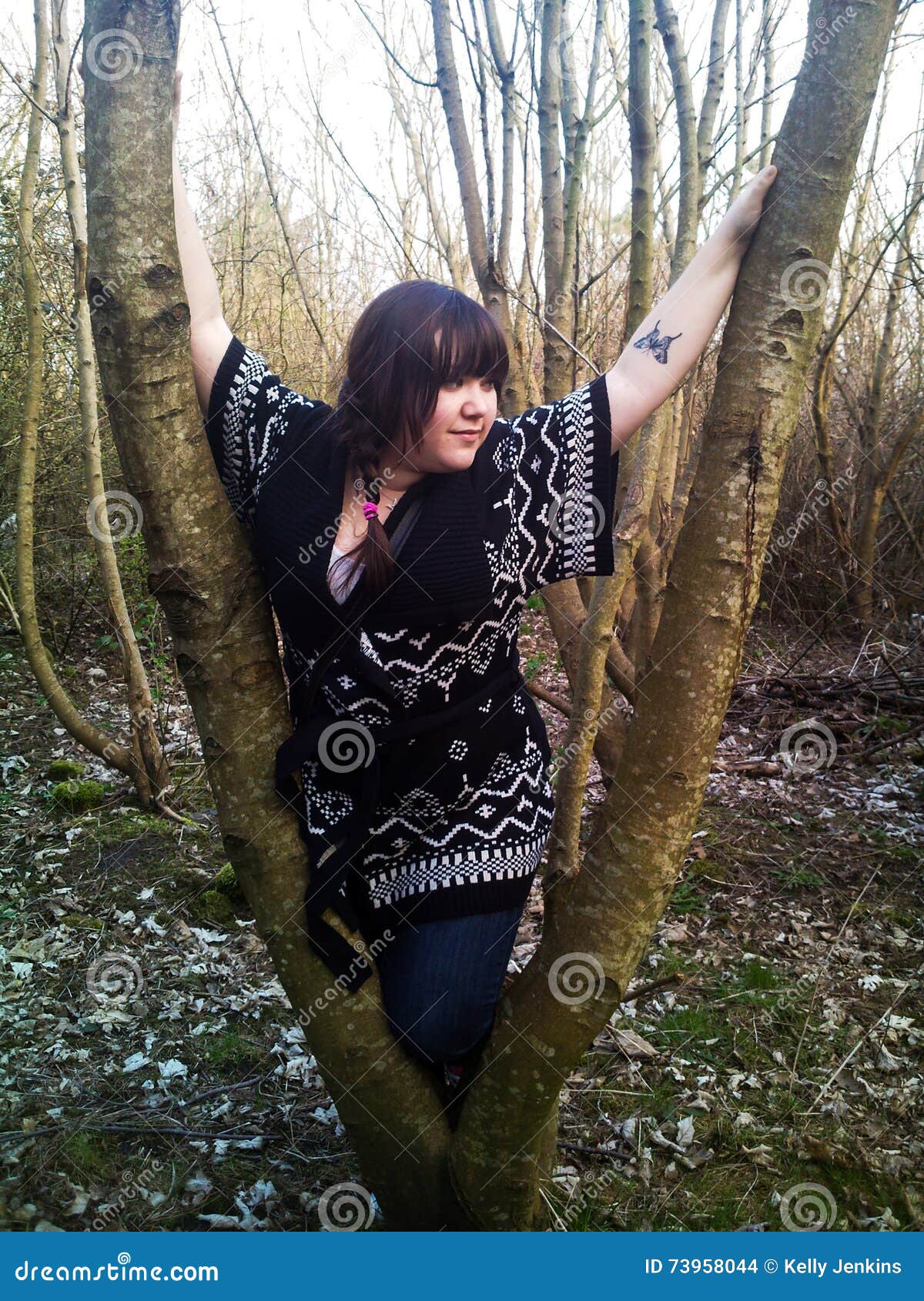 Woman in a Tree stock photo. Image of charming, forest - 73958044