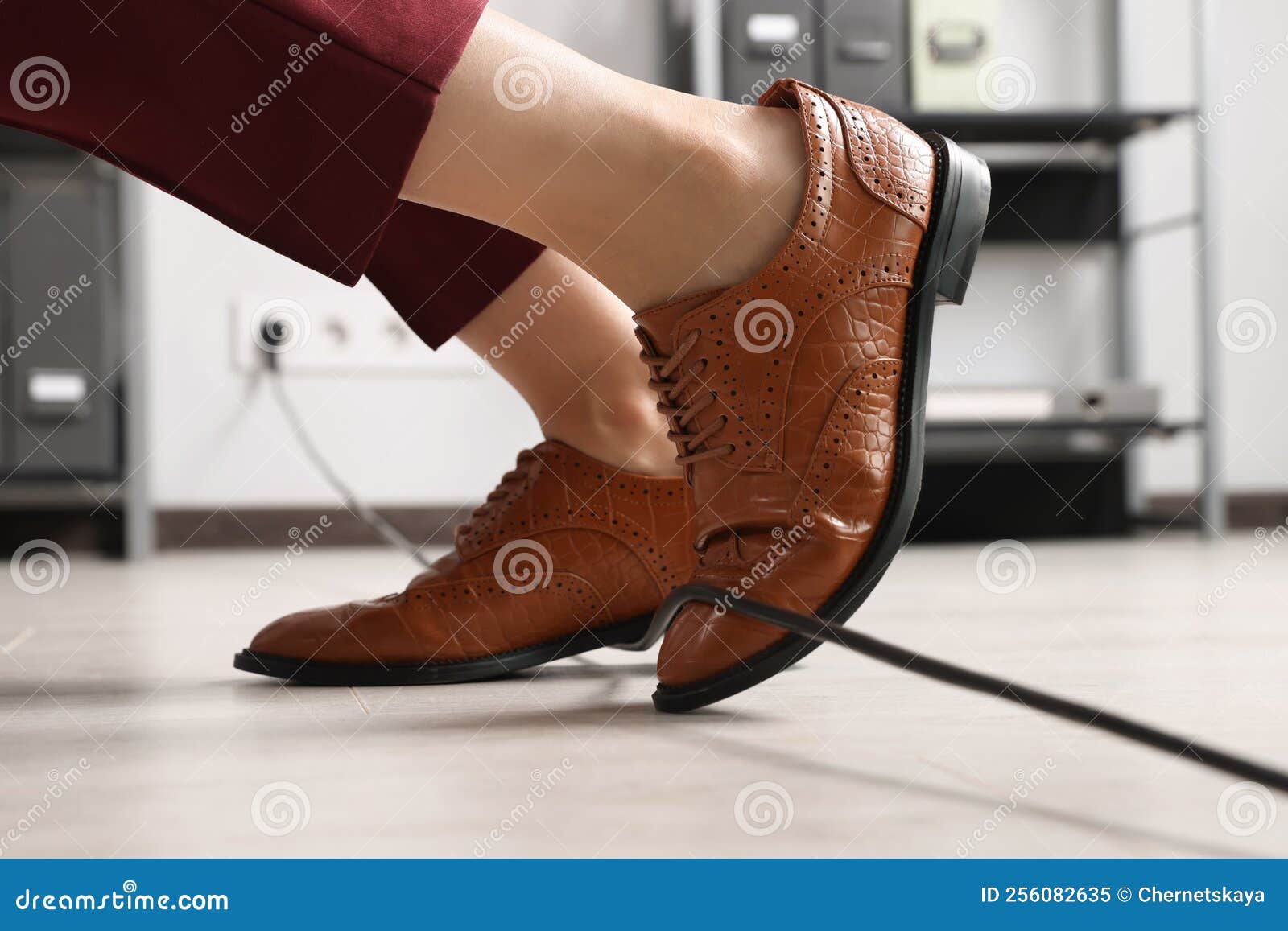 Woman Tripping Over Cable in Office, Closeup Stock Image - Image of ...