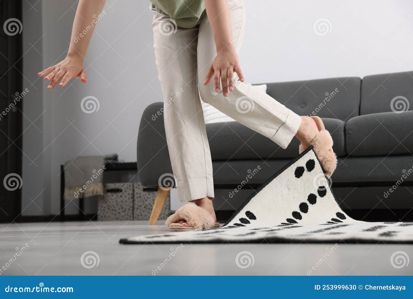 Woman Tripping Over Carpet at Home, Closeup Stock Photo - Image of ...