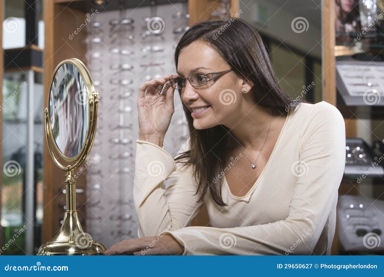 Woman Trying on Spectacles at Shop Stock Image - Image of mirror ...