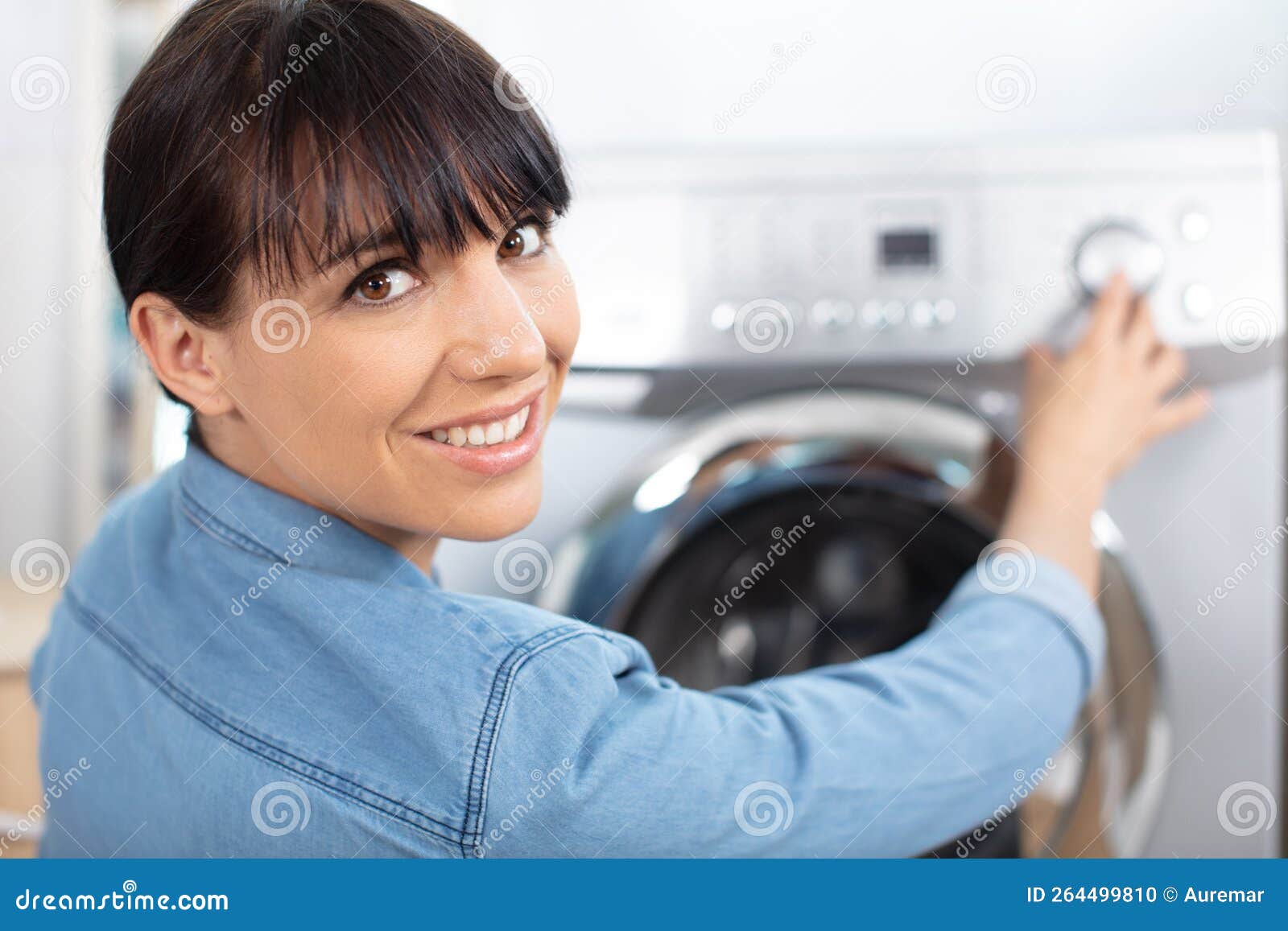 Woman Turning on Washing Machine Stock Photo - Image of lady, detergent ...