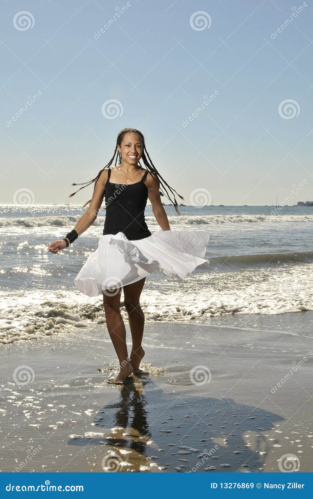 Woman Twirling on Beach in Waves Stock Image - Image of island, relax ...
