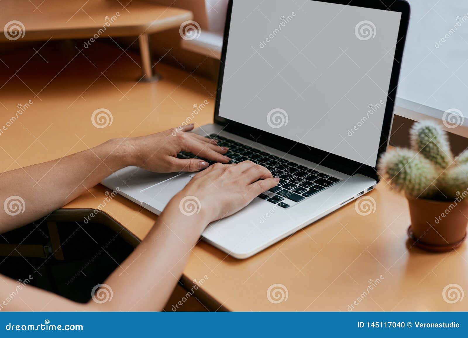 Woman Typing on Her White Laptop Computer at Working Desk Stock Photo ...