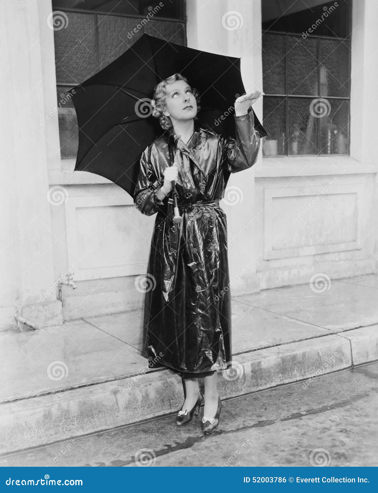 Woman with Umbrella Testing for Rain Stock Photo - Image of formal ...