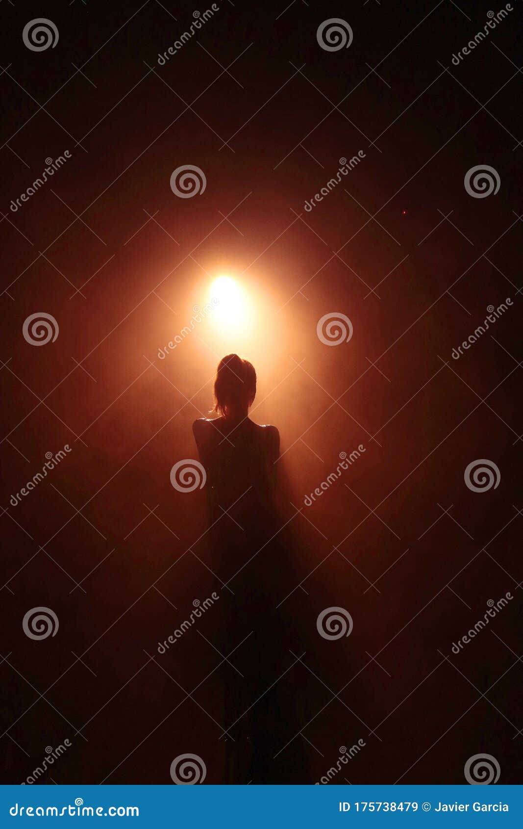 Woman Under an Orange Spotlight Stock Image - Image of effects, music ...