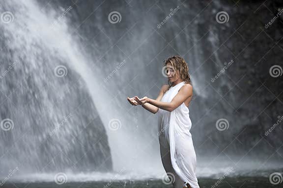 Woman Under Waterfall stock image. Image of inspiration - 25327141