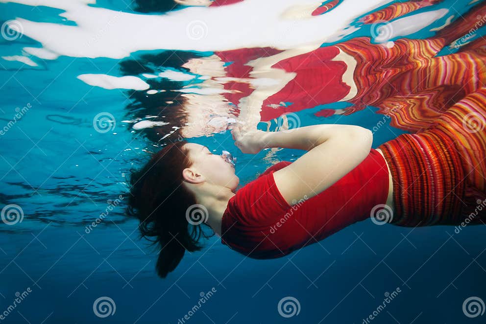 Woman Underwater with Reflection from Surface Stock Photo - Image of ...
