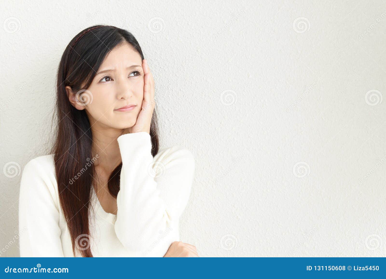 Uneasy Asian woman stock photo. Image of anxious, look - 131150608