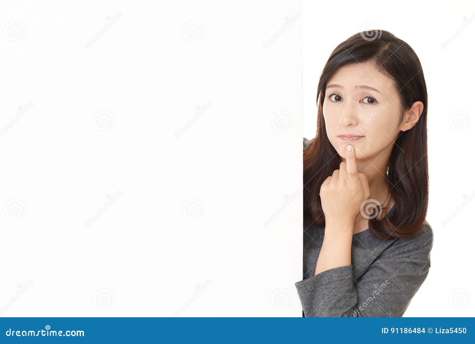 Woman with an uneasy look stock photo. Image of anxious - 91186484