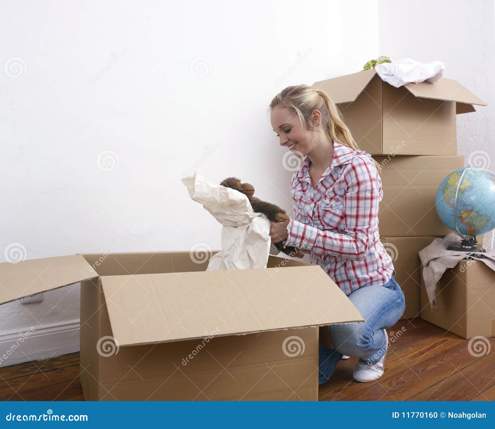 Woman unpacking stock photo. Image of packing, boxes - 11770160
