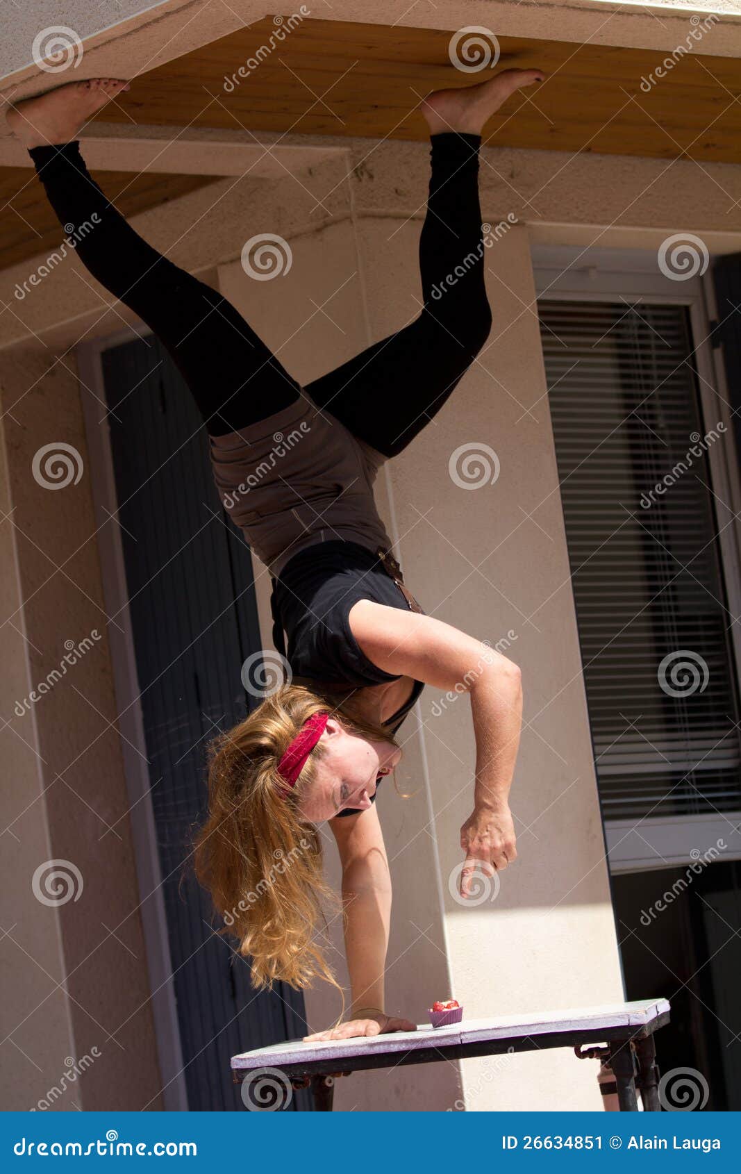 Woman Upside Down on a Table Editorial Photo - Image of dancer ...