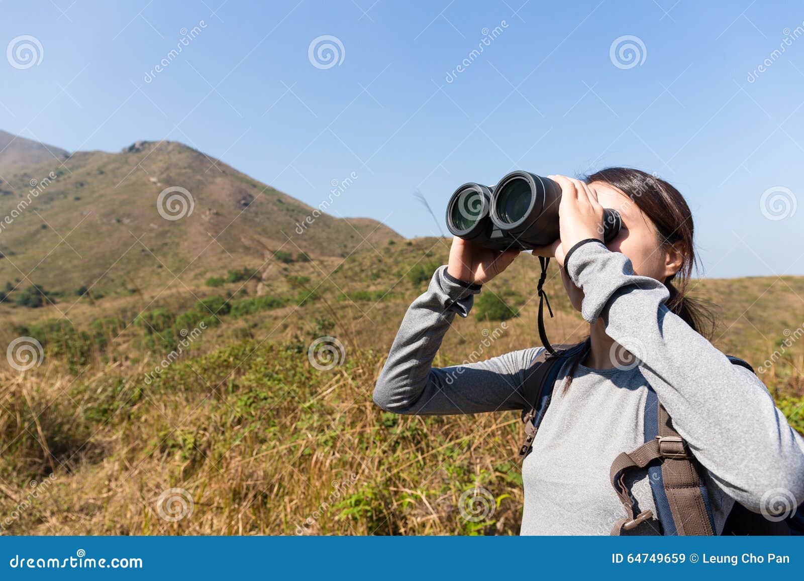 Woman use of the binocular stock image. Image of clear - 64749659