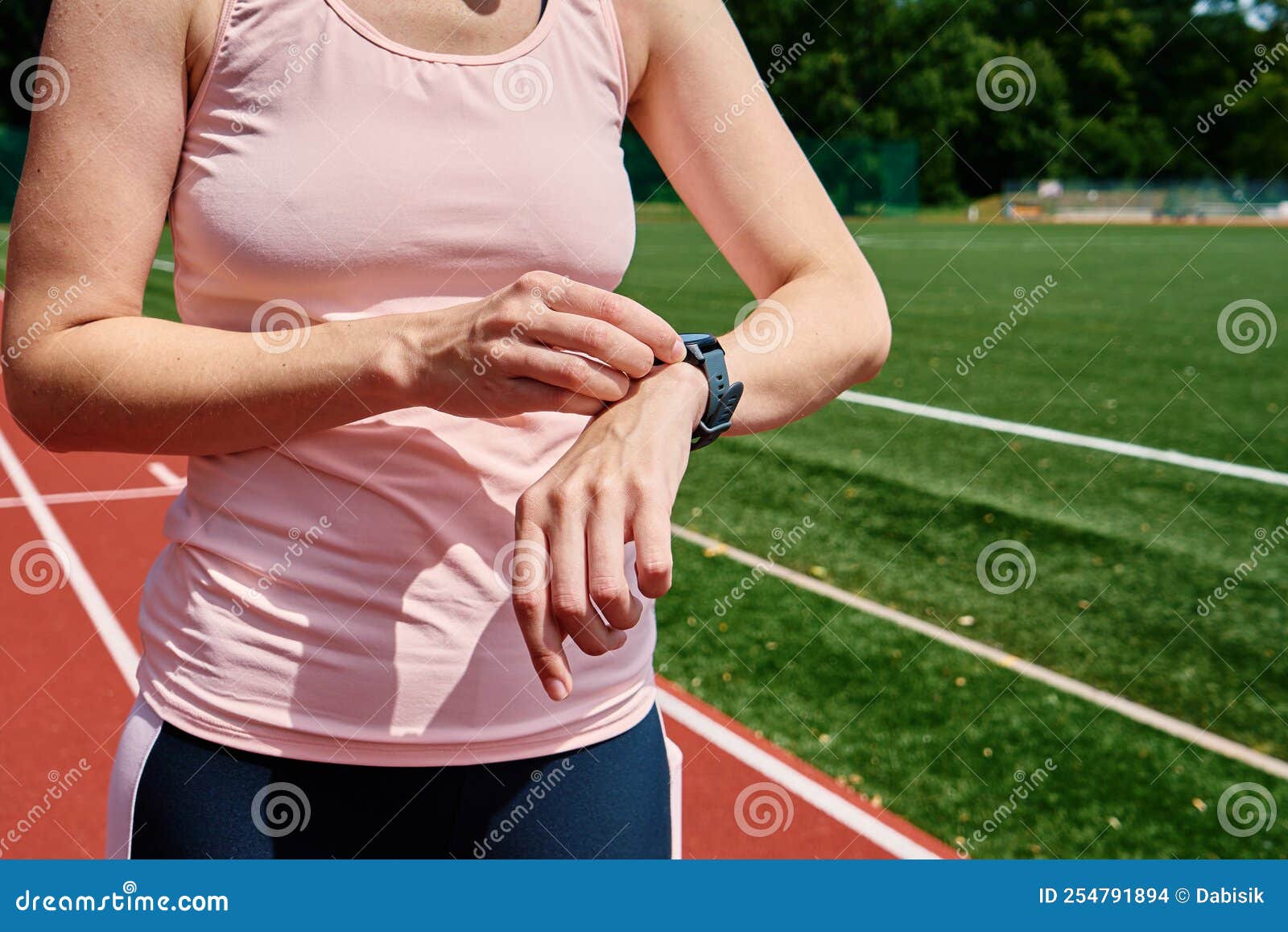 Woman Use Fitness Smart Watch, Checking Results after Sport Training ... Woman Use Fitness Smart Watch, Checking Results after Sport Training ...