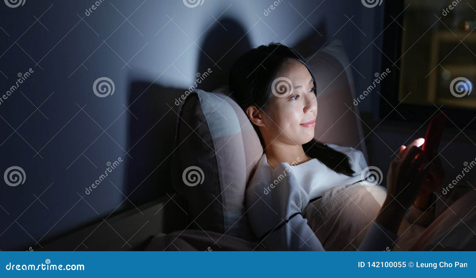 Woman Use of Mobile Phone on Bed Stock Image - Image of lying, asleep ...