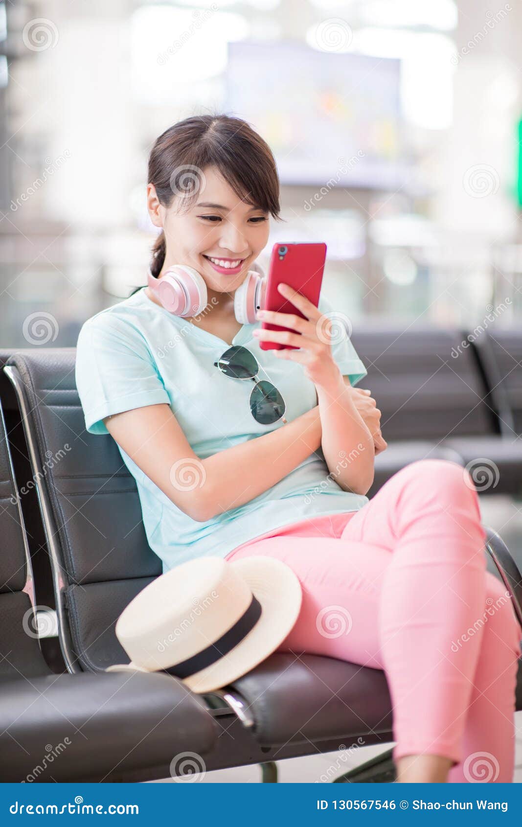 Woman use phone happily stock photo. Image of cell, social - 130567546