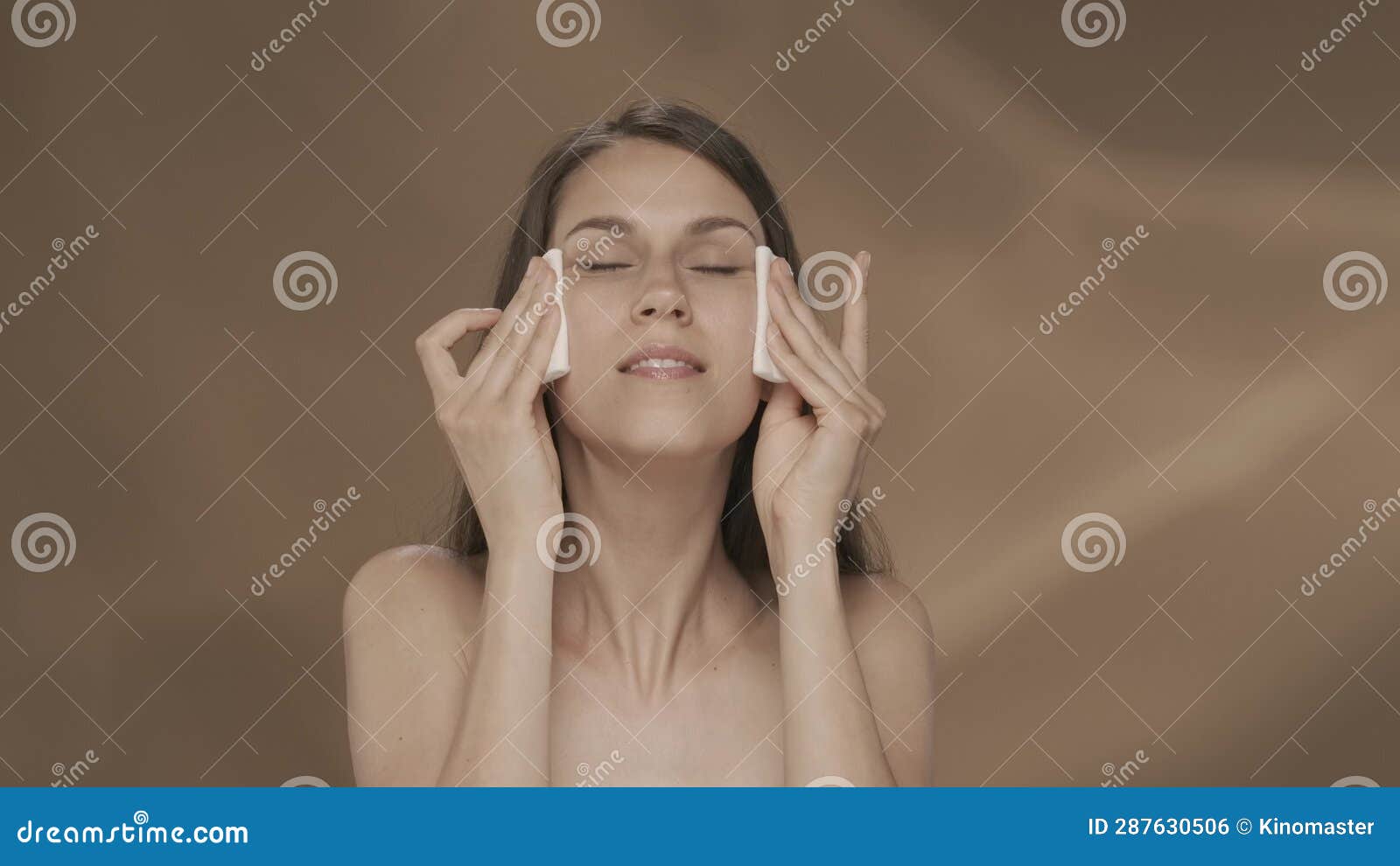 A Woman Uses A Cotton Pads To Cleanse Her Face Portrait Of A Young