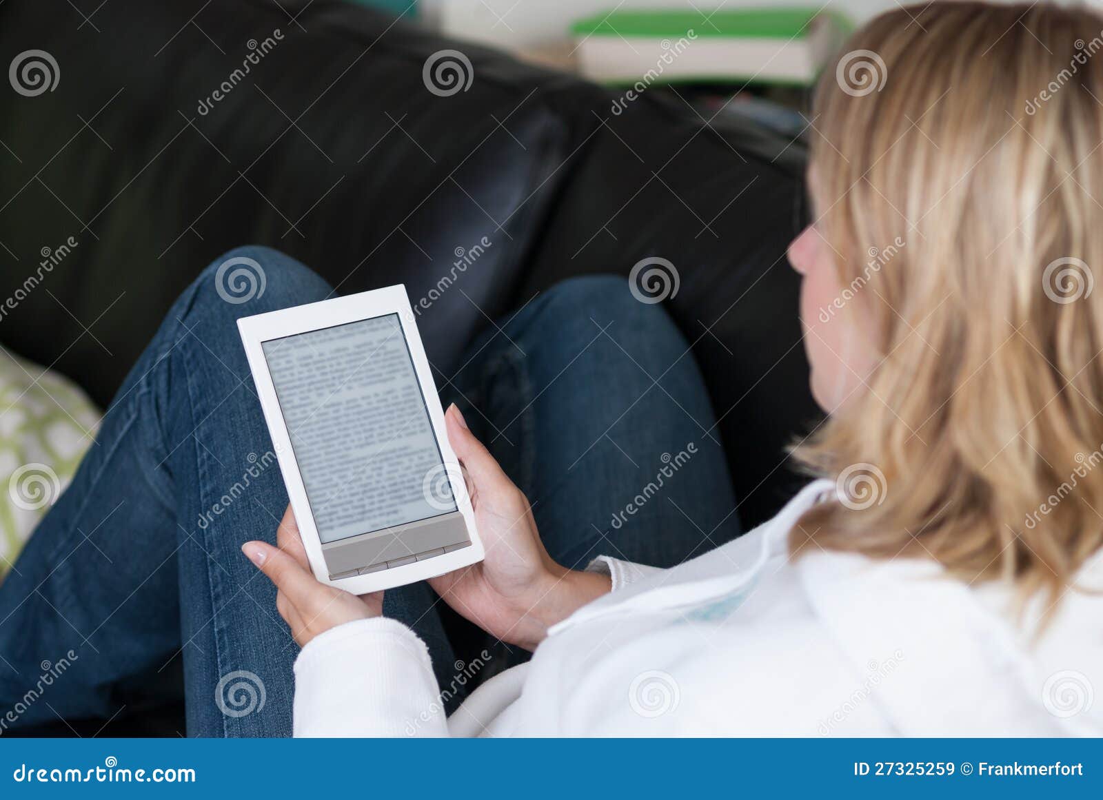 Woman uses an ebook reader stock image. Image of rest - 27325259