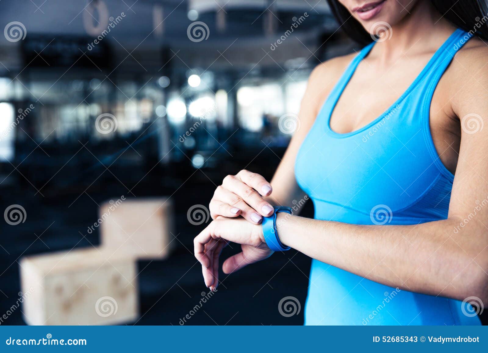 Woman Using Activity Tracker Stock Image - Image of pulse, blue: 52685343