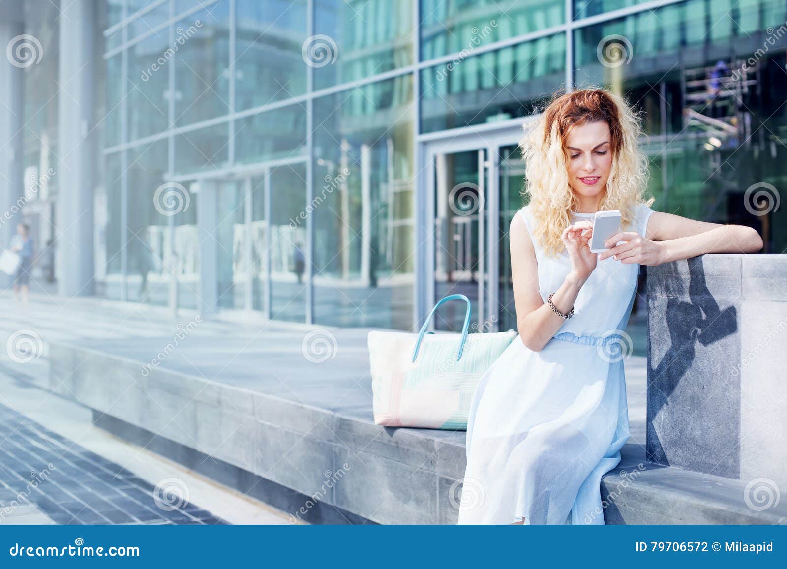 Woman Using App on Her Phone Stock Photo - Image of cute, cheerful ...