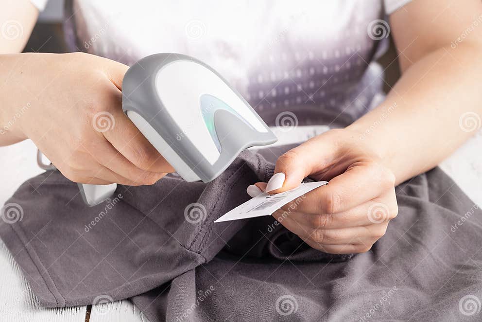Woman Using Barcode Scanner on Clothes Stock Photo - Image of clothing ...