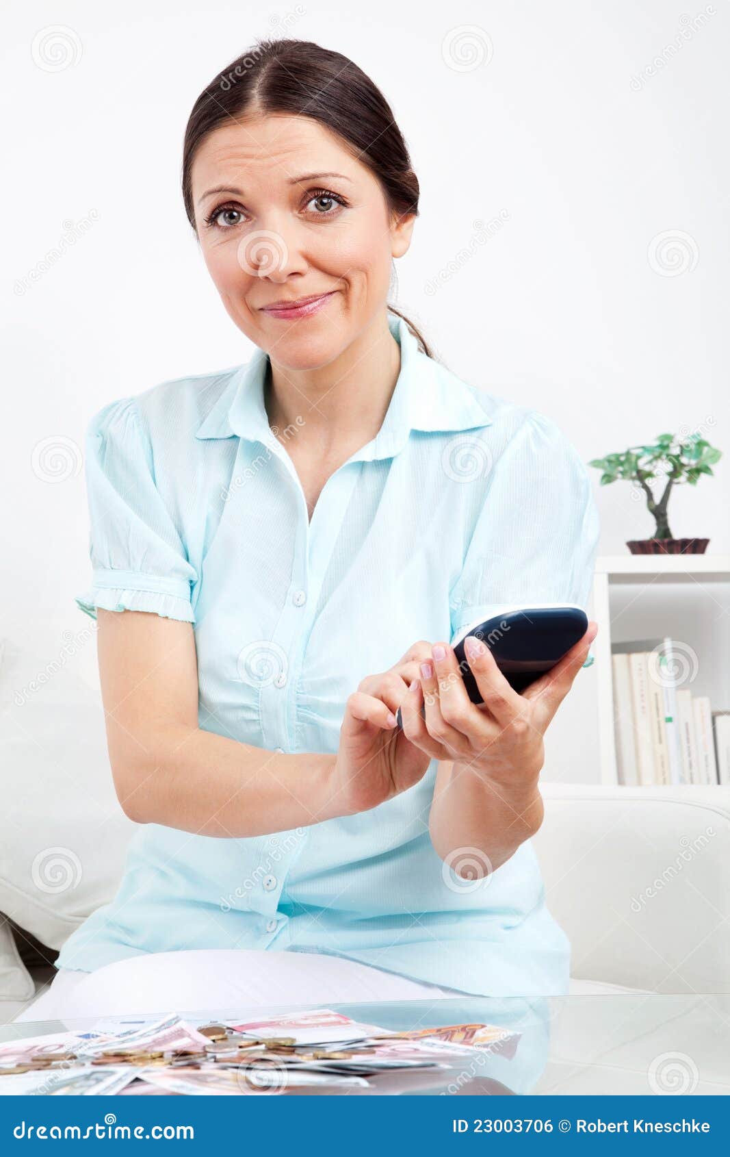 Woman using calculator stock photo. Image of caucasian - 23003706