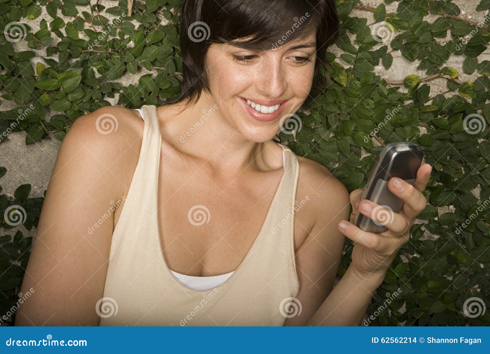 Woman using cell phone stock photo. Image of latin, message - 62562214