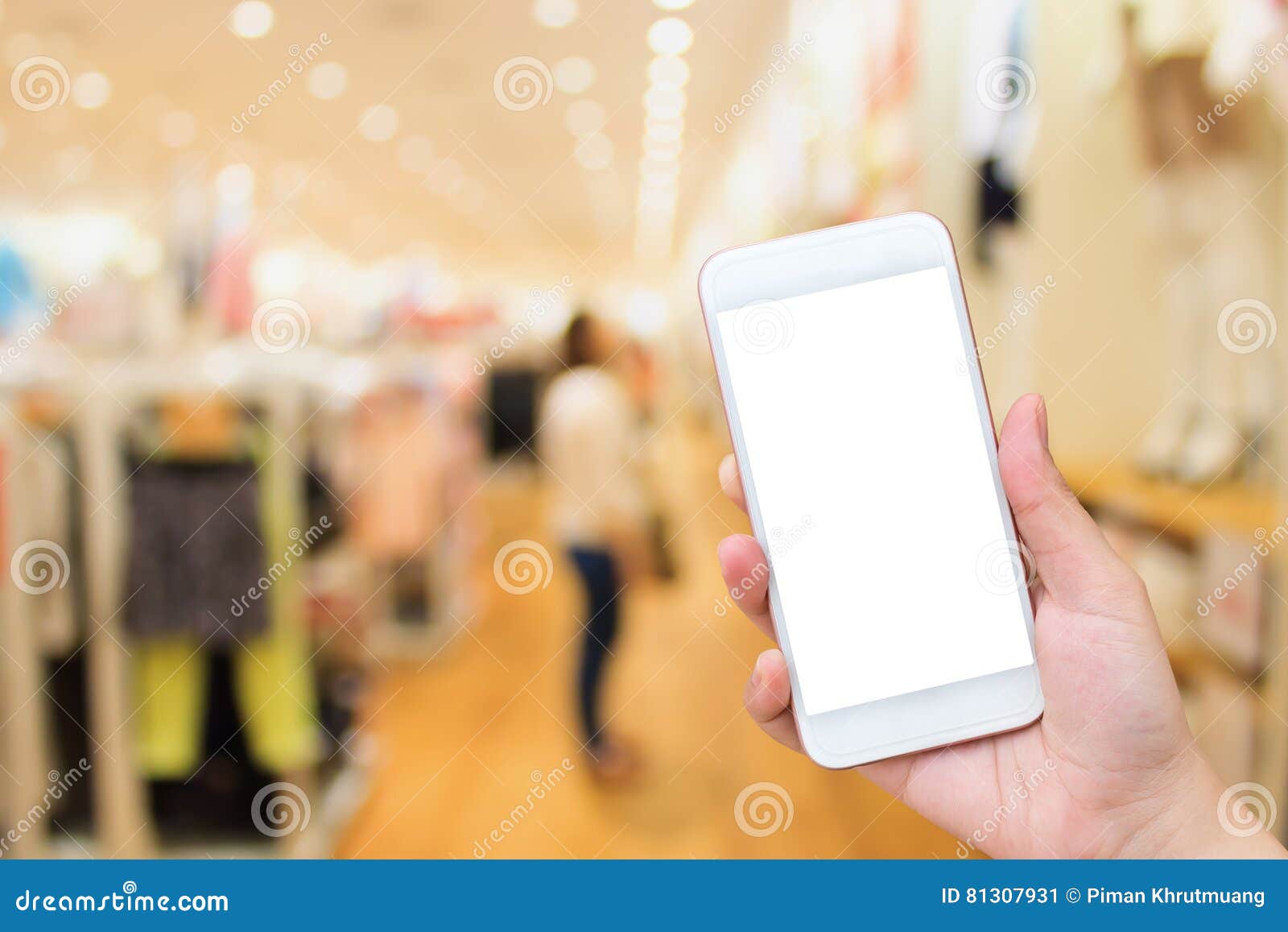 Woman Using Cell Phone in Clothing Store Stock Image - Image of smart ...