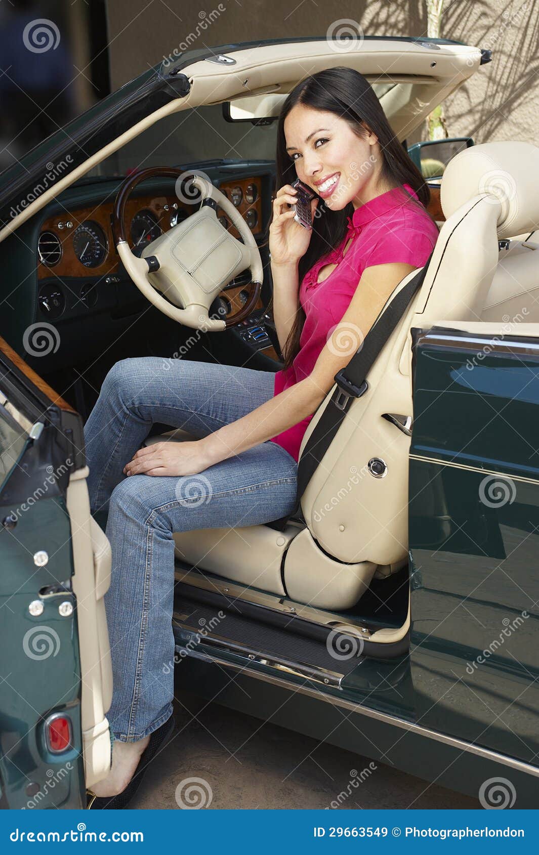 Woman Using Cell Phone in a Convertible Stock Image - Image of ...