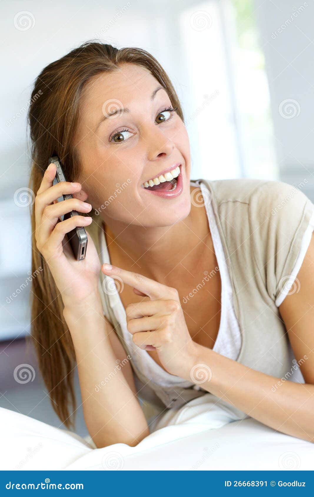 Woman using cellphone stock image. Image of smiling, portrait - 26668391