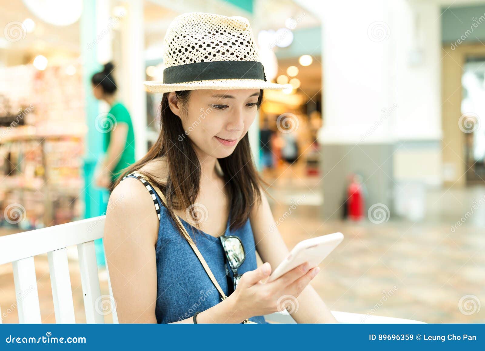 Woman Using Cellphone in Shopping Mall Stock Image - Image of inside ...