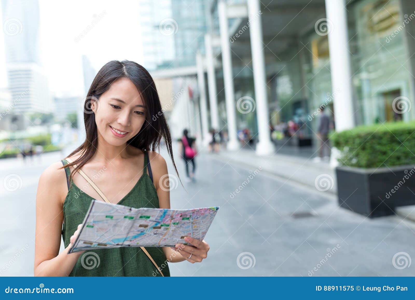 Woman using city map stock image. Image of search, cityscape - 88911575