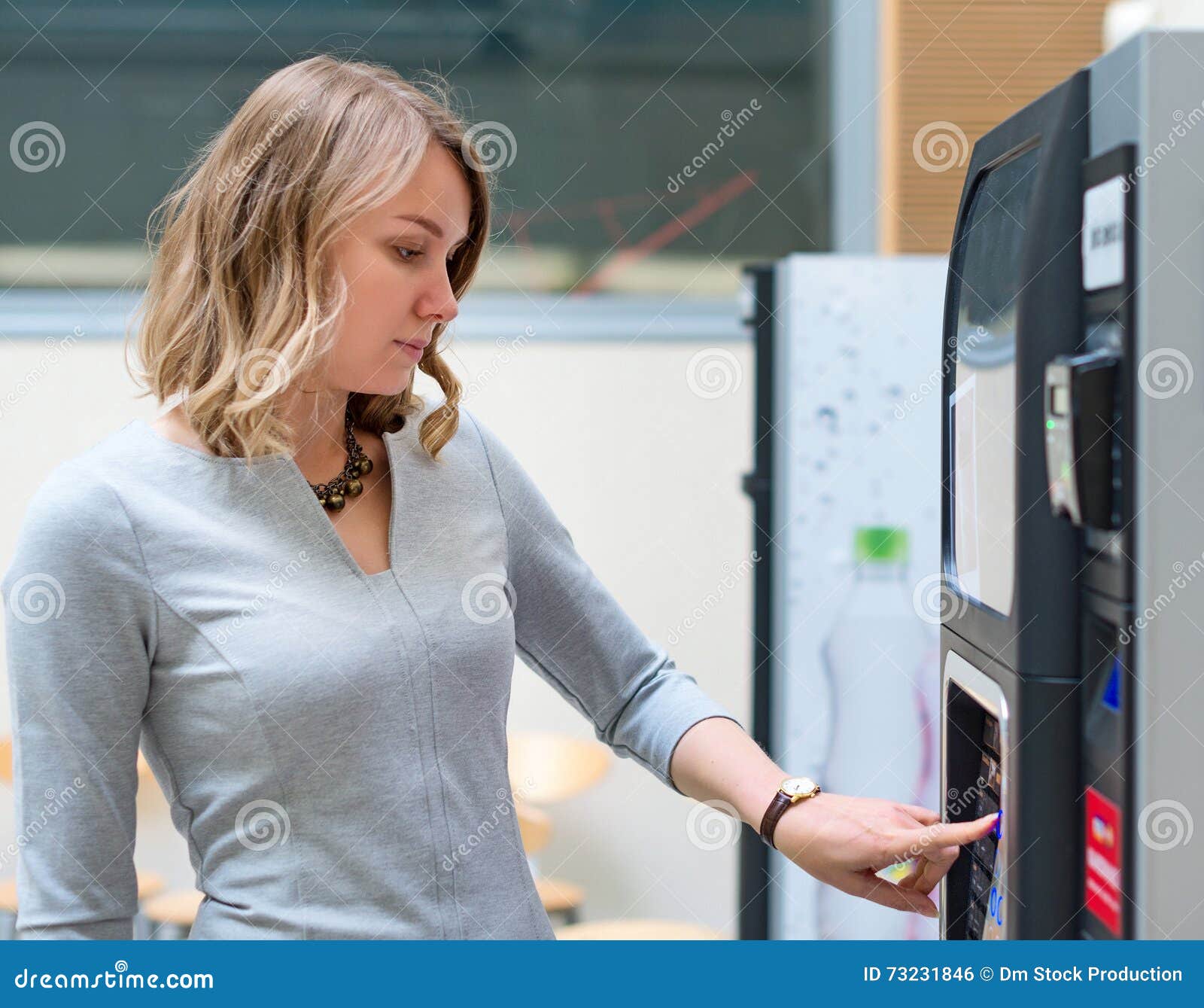 Woman Using Coffee Vending Machine. Stock Photo - Image of making ...