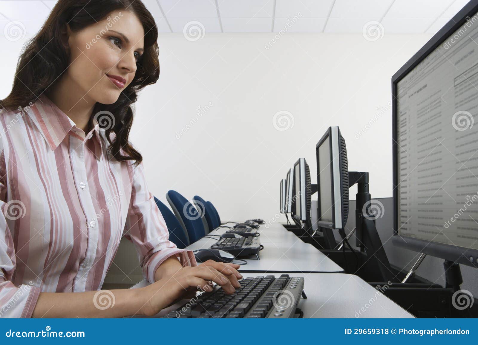 Woman Using Computer stock photo. Image of executive - 29659318