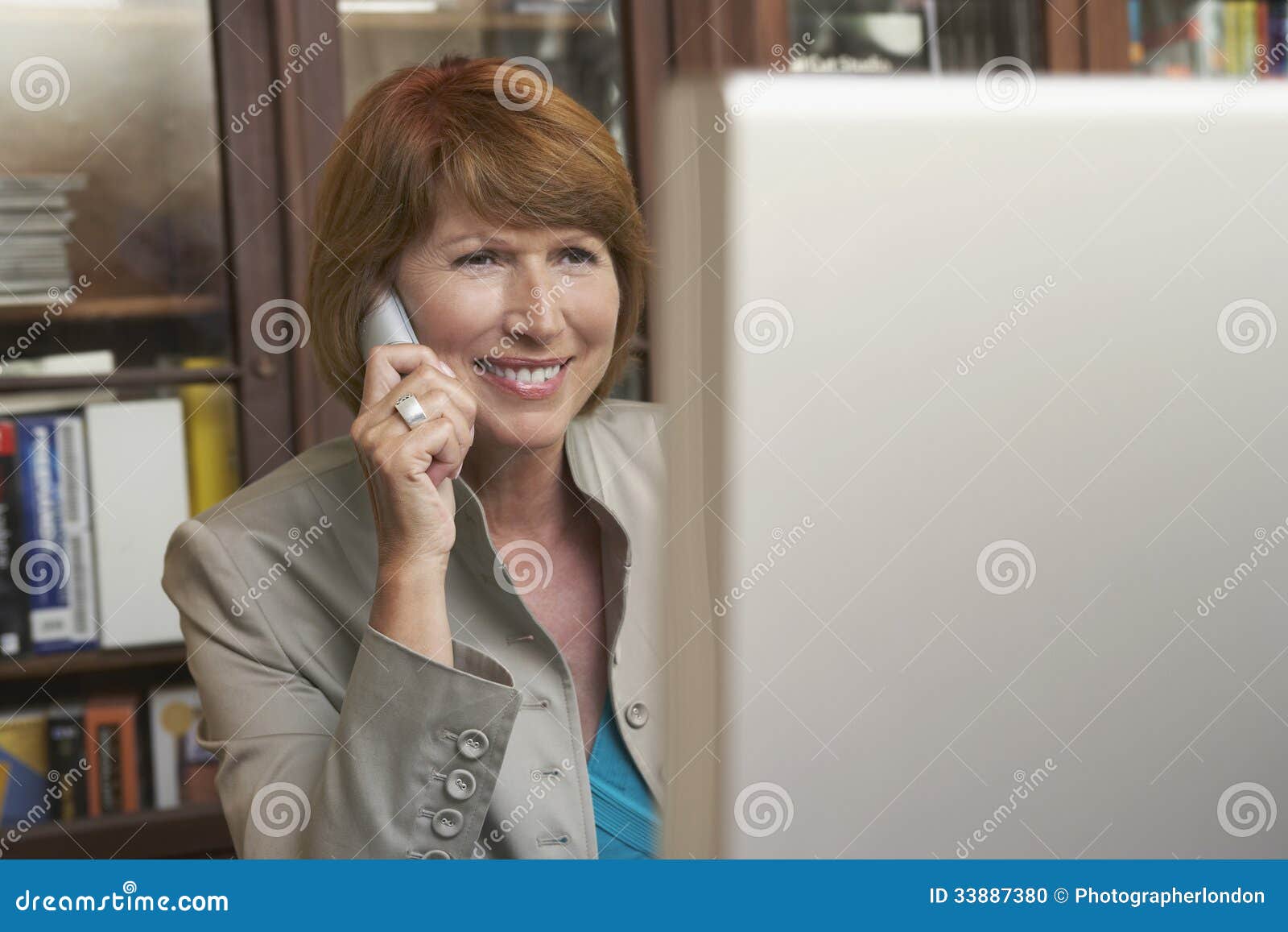 Woman Using Computer and Cellphone in Study Room Stock Photo - Image of ...