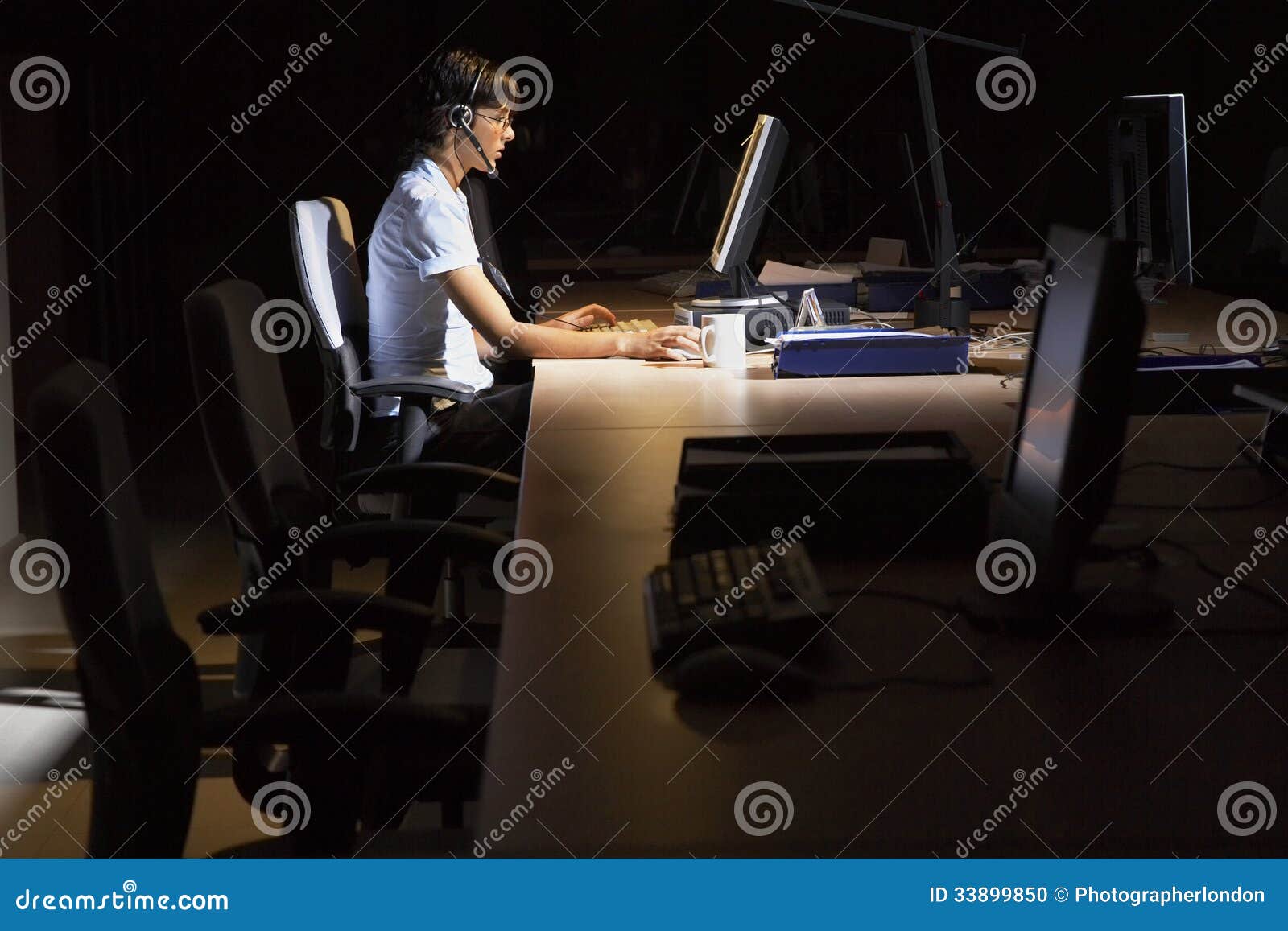 Woman Using Computer in Dark Office Stock Photo - Image of overworked ...