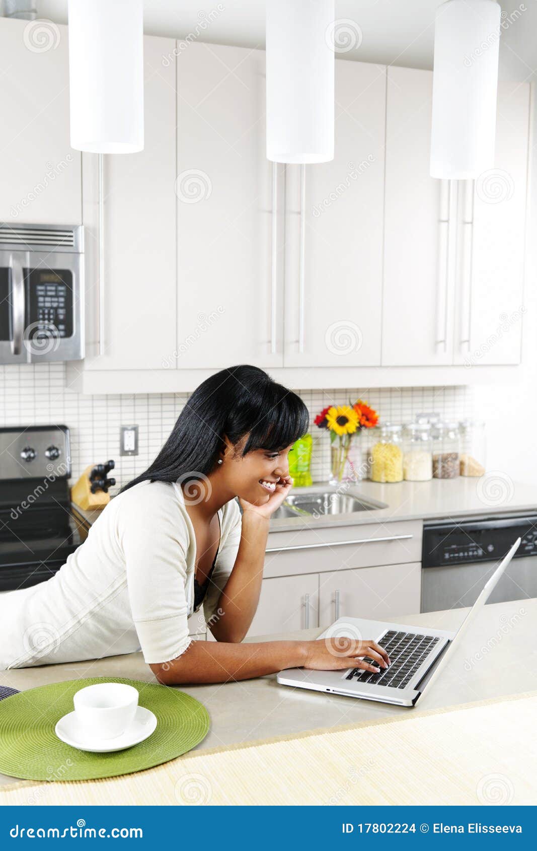 Woman Using Computer in Kitchen Stock Photo - Image of female, domestic ...