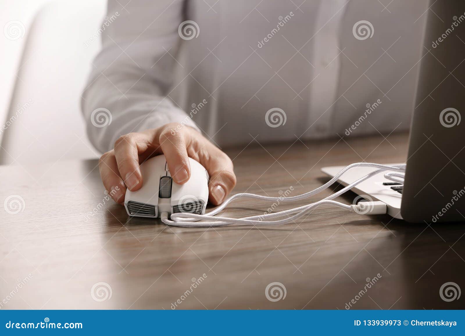Woman Using Computer Mouse with Laptop at Table Stock Image - Image of ...