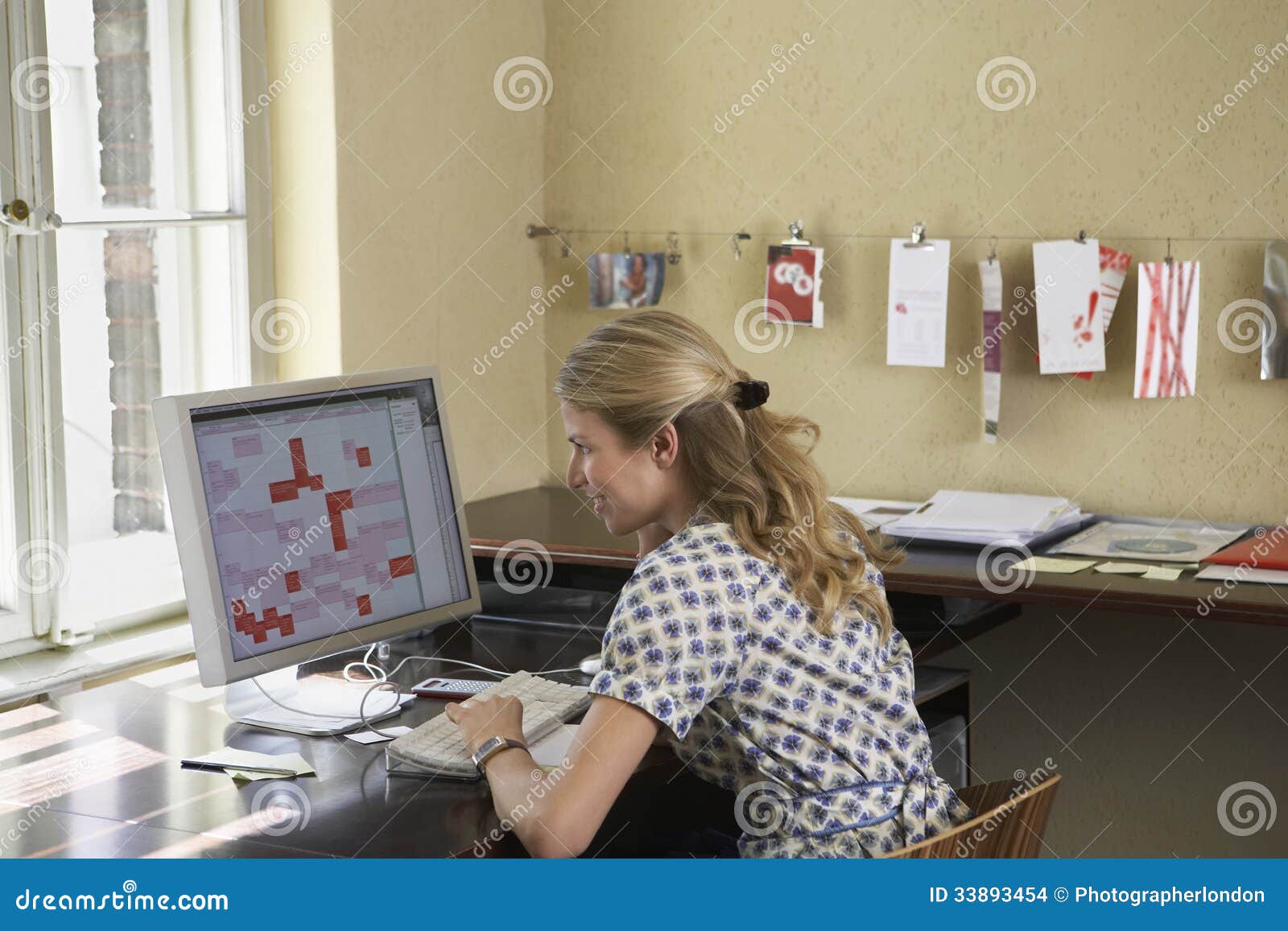 Woman Using Computer in Office Stock Photo - Image of indoors, calendar ... Woman Using Computer in Office Stock Photo - Image of indoors, calendar ...