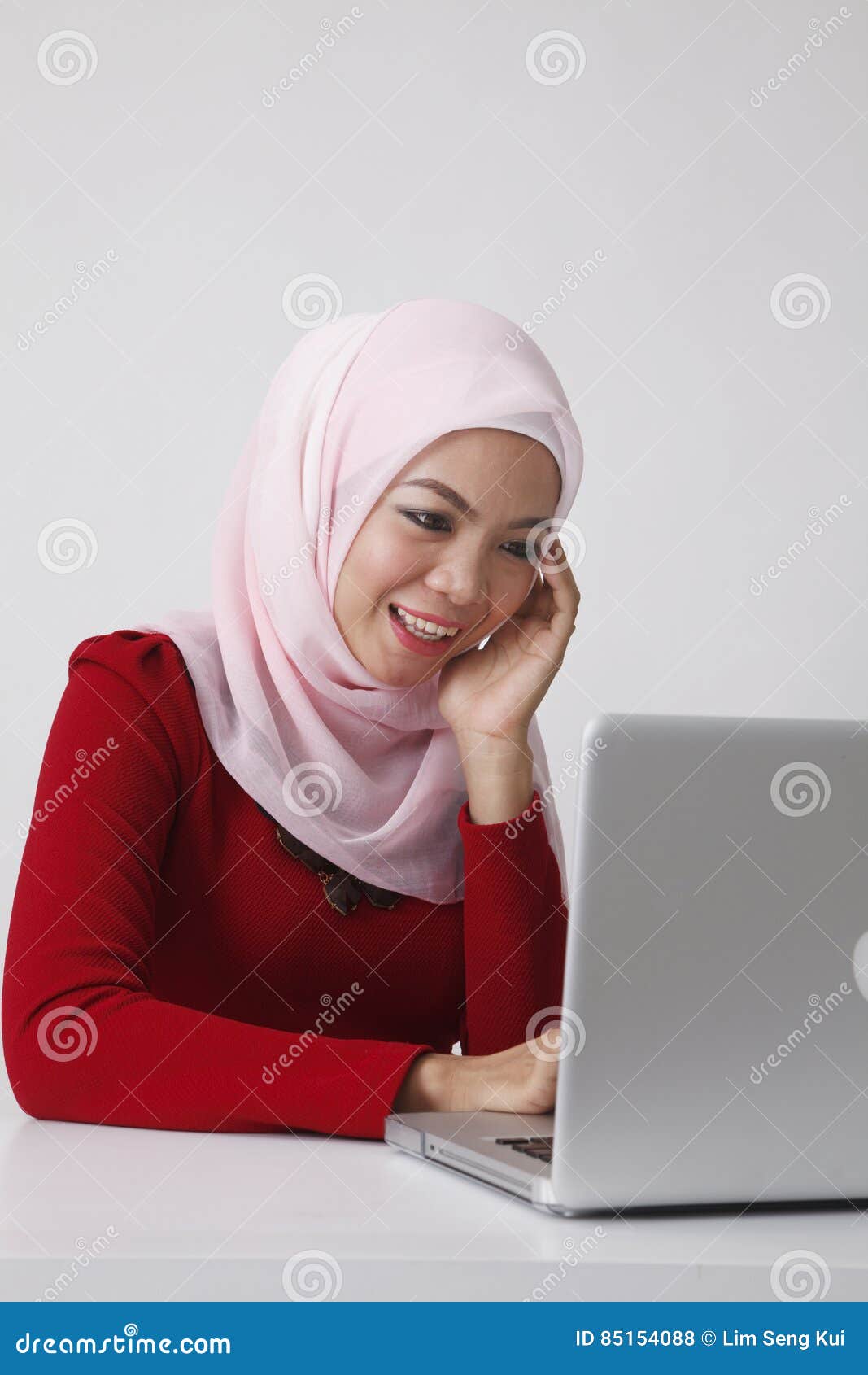 Woman Using Computer Smiling Stock Photo - Image of girl, head: 85154088