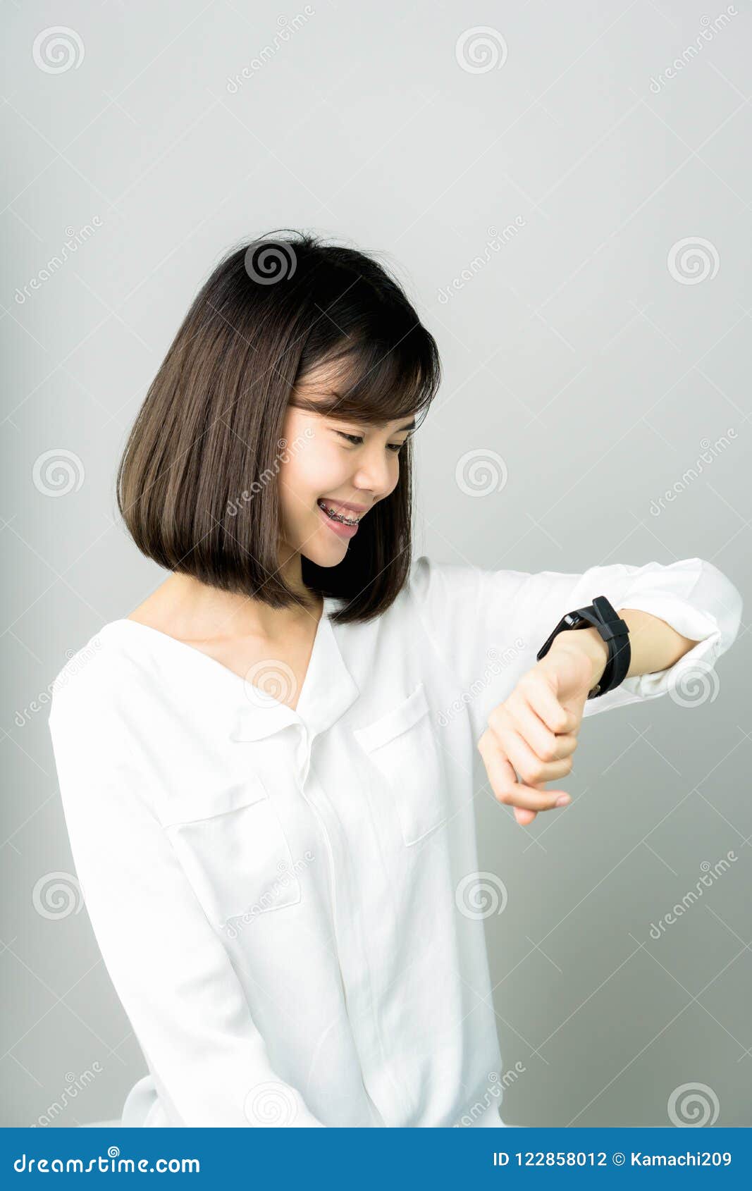 Woman Using a Digital Clock in the Display and Technology Advances in ...