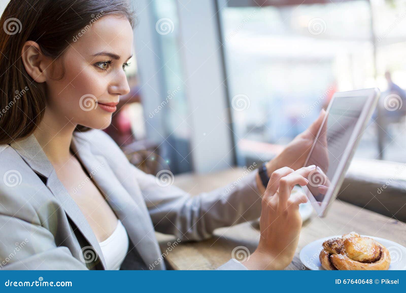 Woman Using Digital Tablet in Cafe Stock Photo - Image of book ... Woman Using Digital Tablet in Cafe Stock Photo - Image of book ...