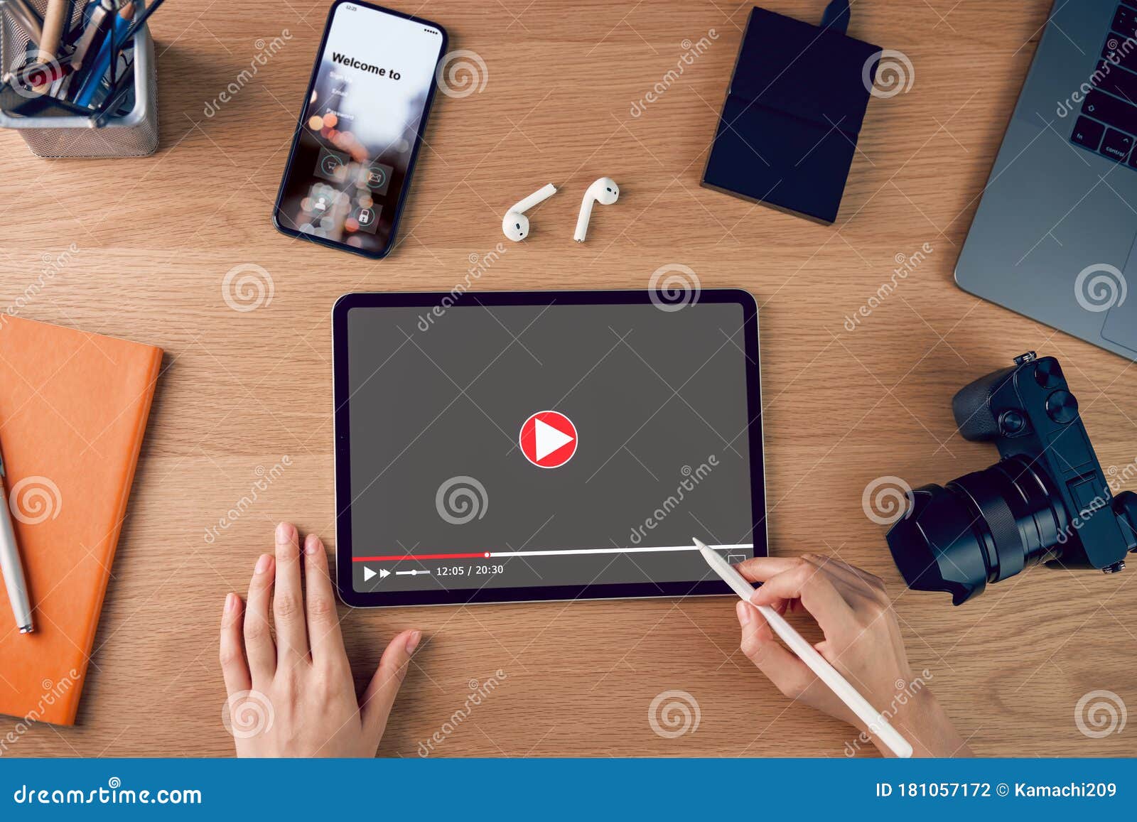 Woman Using Digital Tablet and Watching Video Online with Camera and ...